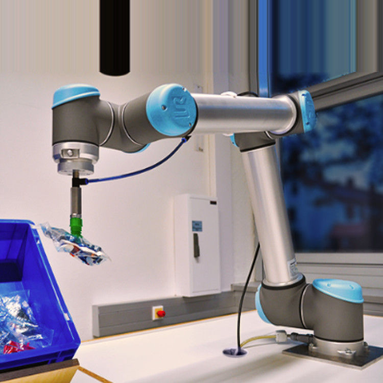 UR10 Universal Robot Cobot With Gripper As Assembly Machine For Engine ...